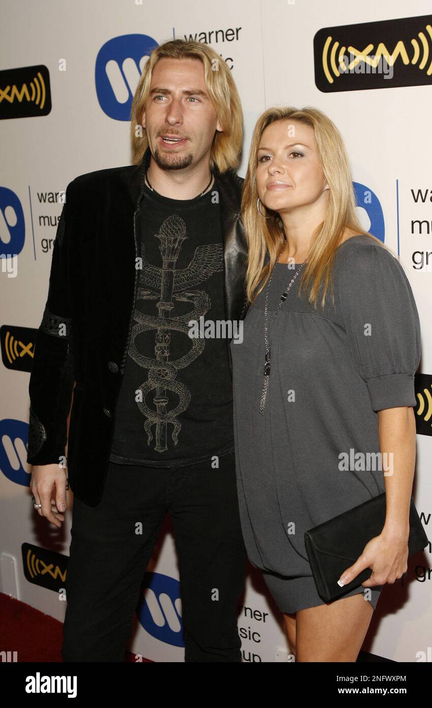 Chad Kreoger of Nickelback and his wife Marianne Gurick arrive at the ...