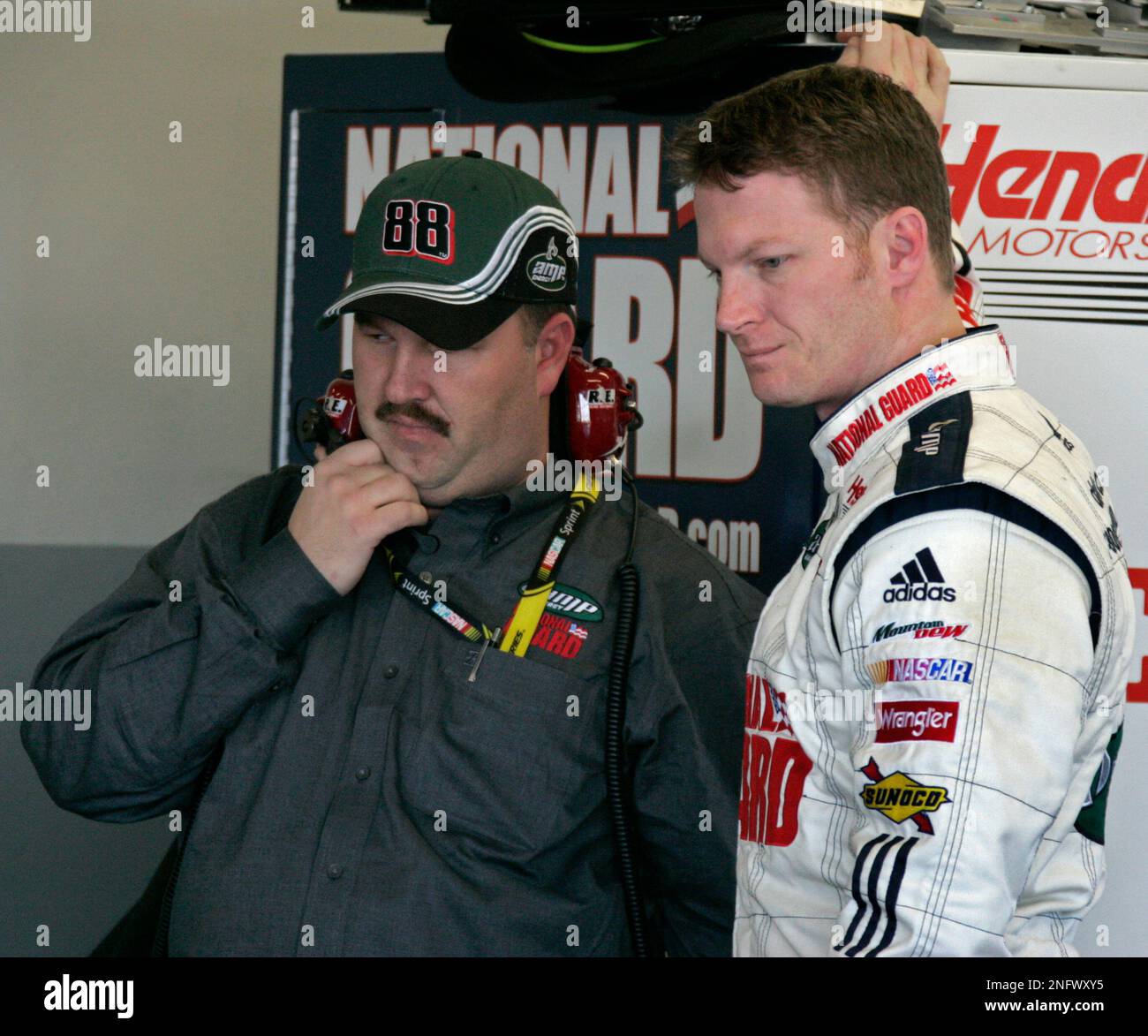 NASCAR driver Dale Earnhardt Jr., right, in his garage with crew chief ...
