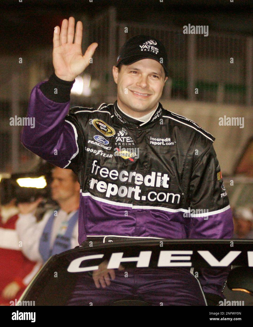 NASCAR driver David Gilliland waves to fans prior to the start of the ...