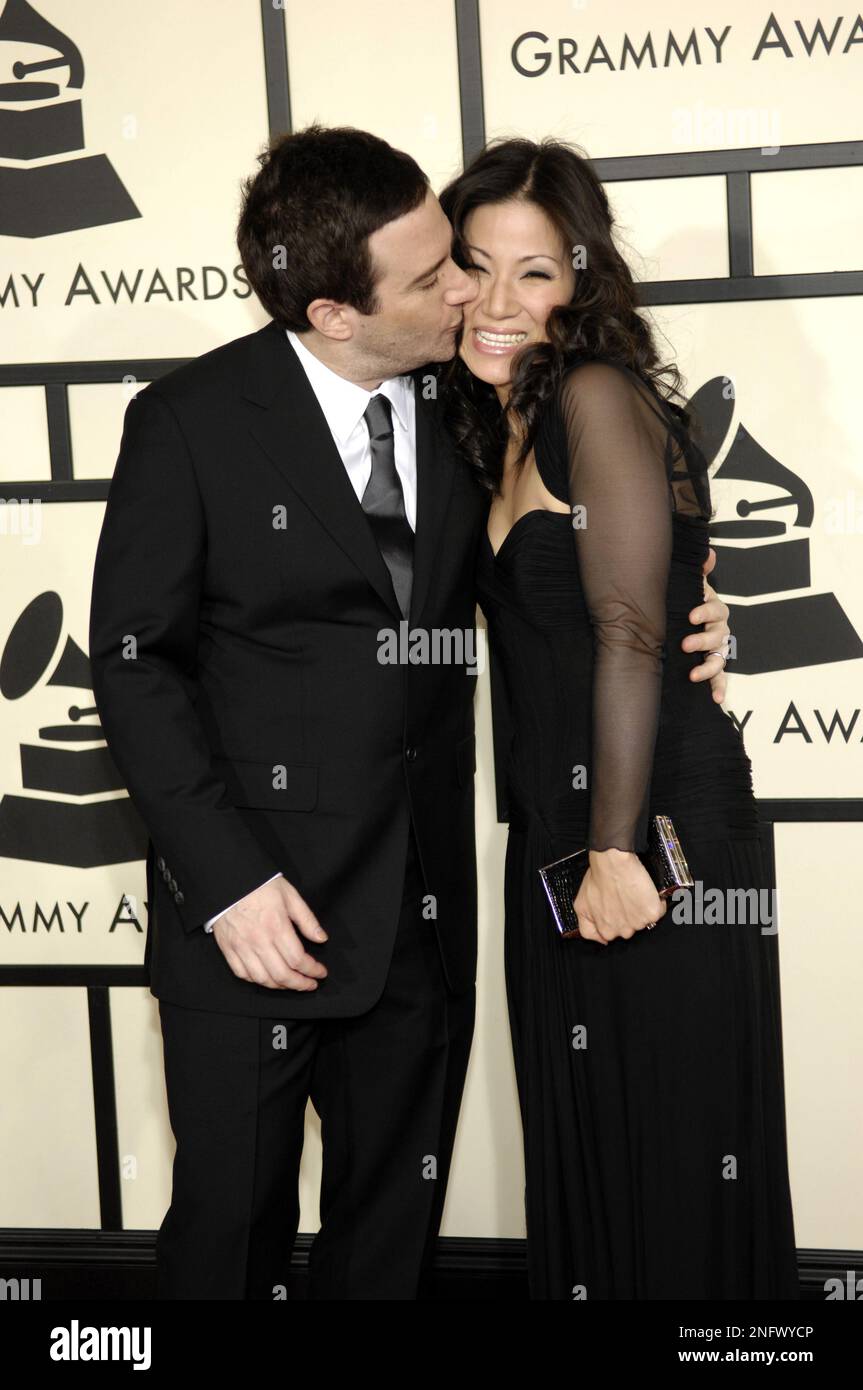 Greg Wattenberg and guest arrive at the 50th Annual Grammy Awards on ...