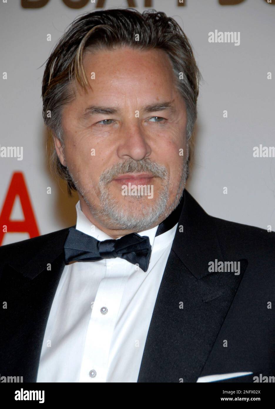 Actor Don Johnson poses on the press line at the opening gala ...