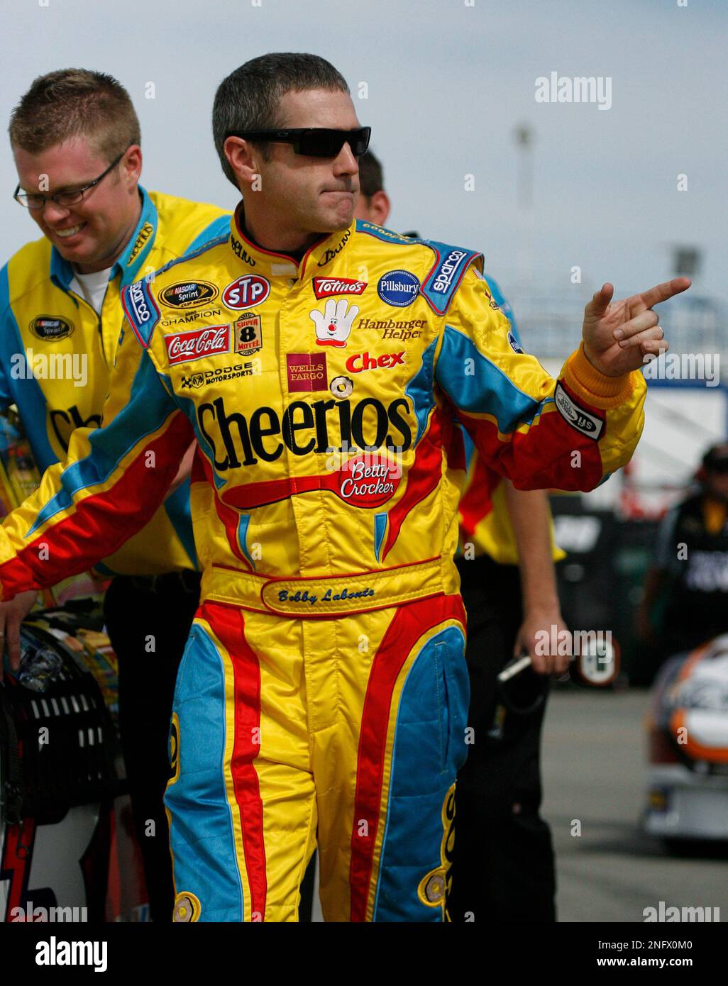 NASCAR driver Bobby Labonte pushes his car during practice for the ...