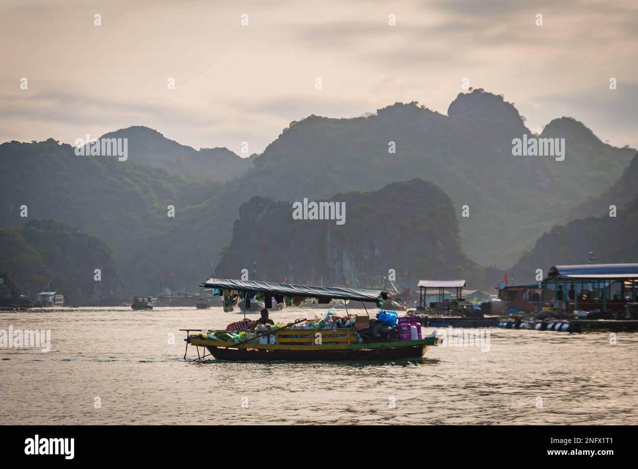 Floating village in Ha Long Bay, Vietnam Stock Photo - Alamy