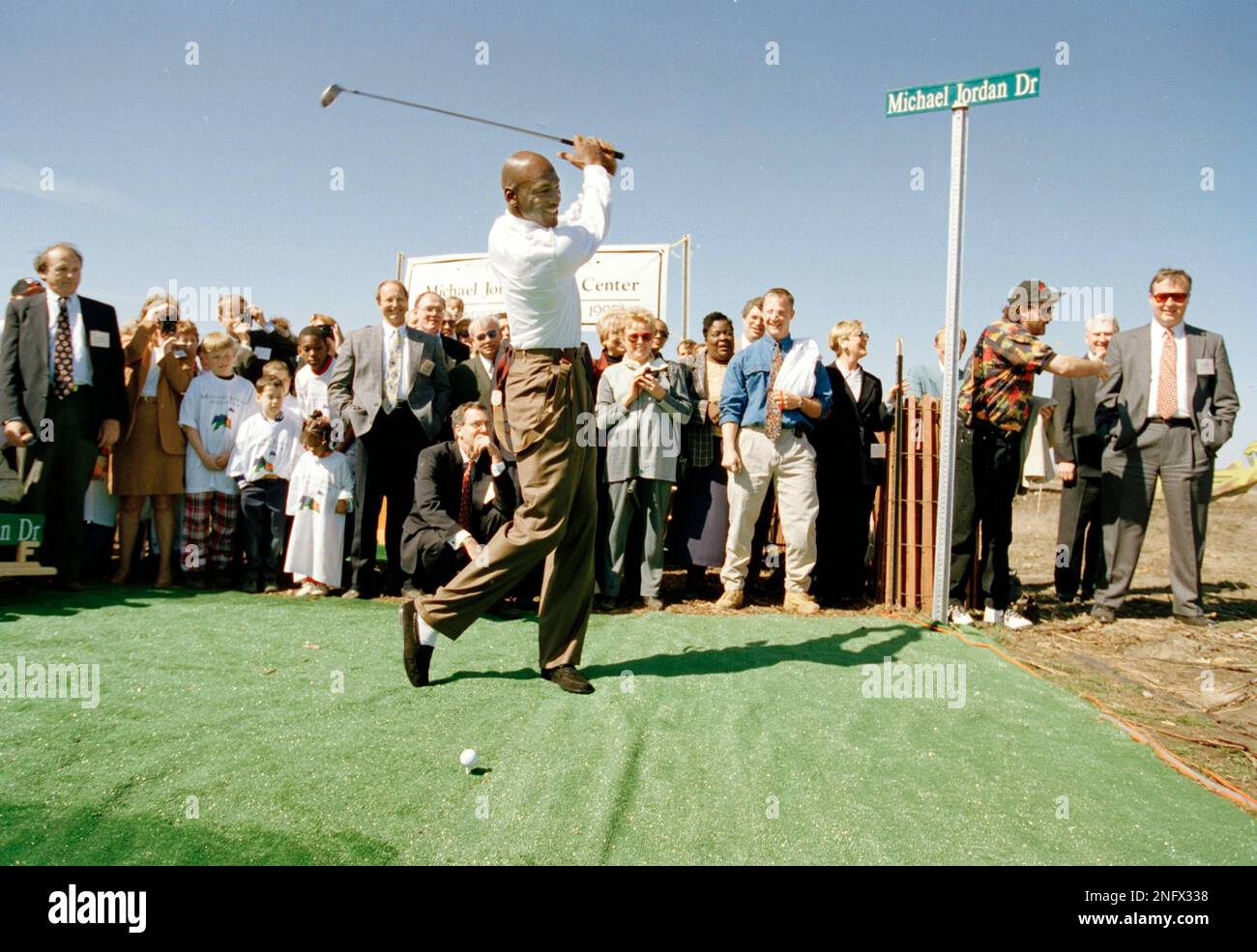 Chicago Bulls' Michael Jordan takes the first ceremonial swing at the ...