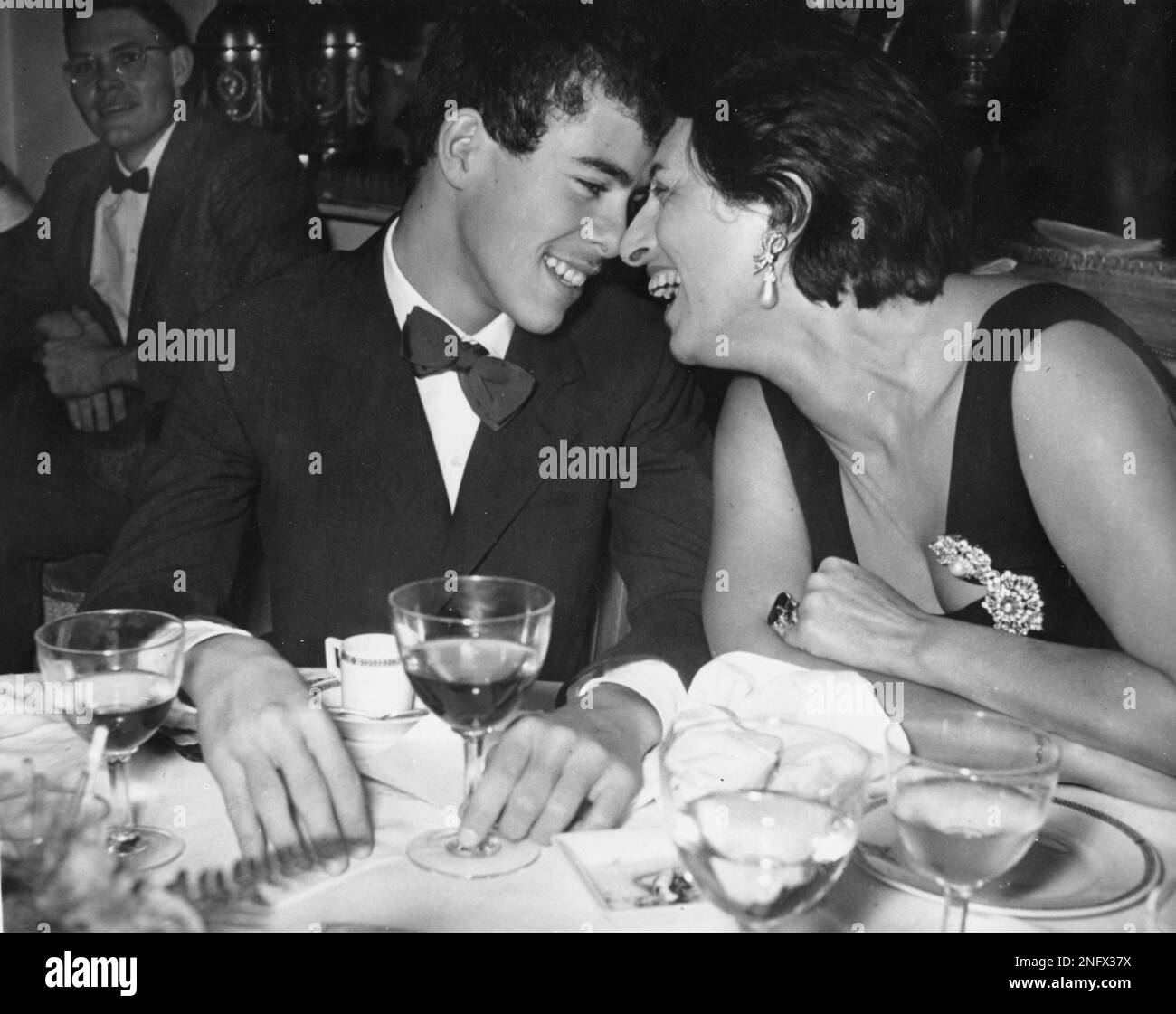 Anna Magnani, right, rubs noses with her son Luca as they celebrate the ...
