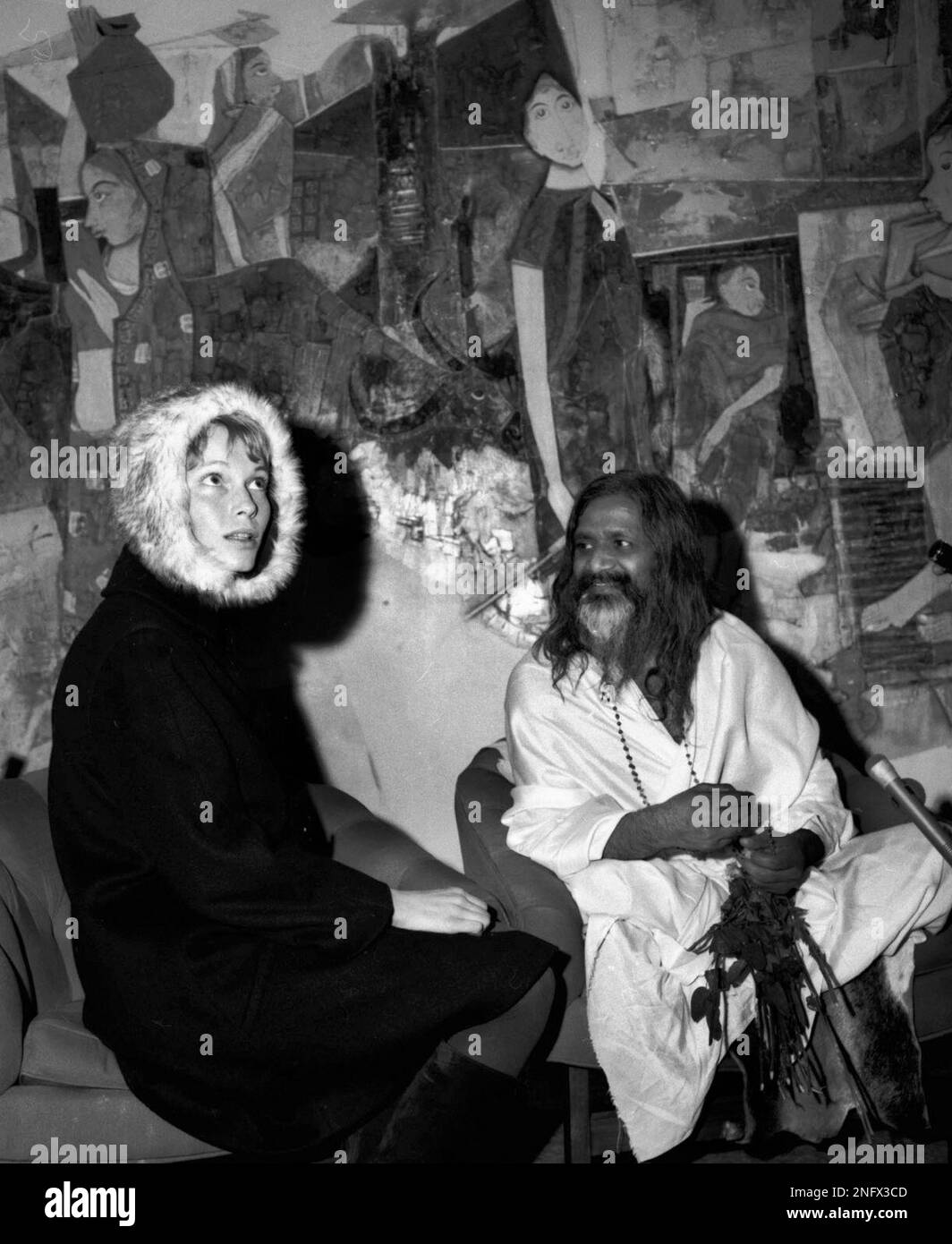 Maharishi Mahesh Yogi, one of India's spiritual teachers, sits with ...