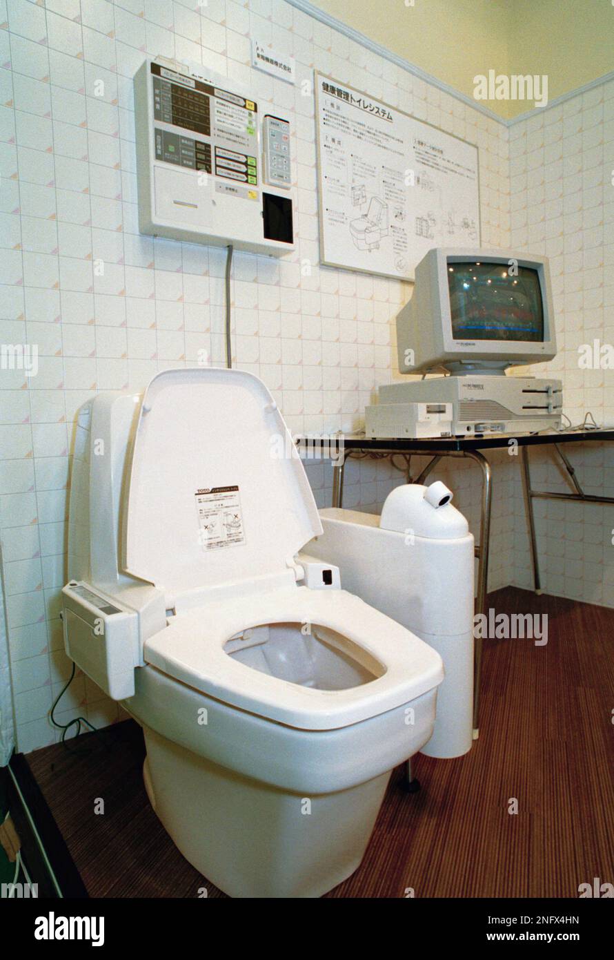 A new high-tech toilet, shown at a housing fair in downtown Tokyo ...