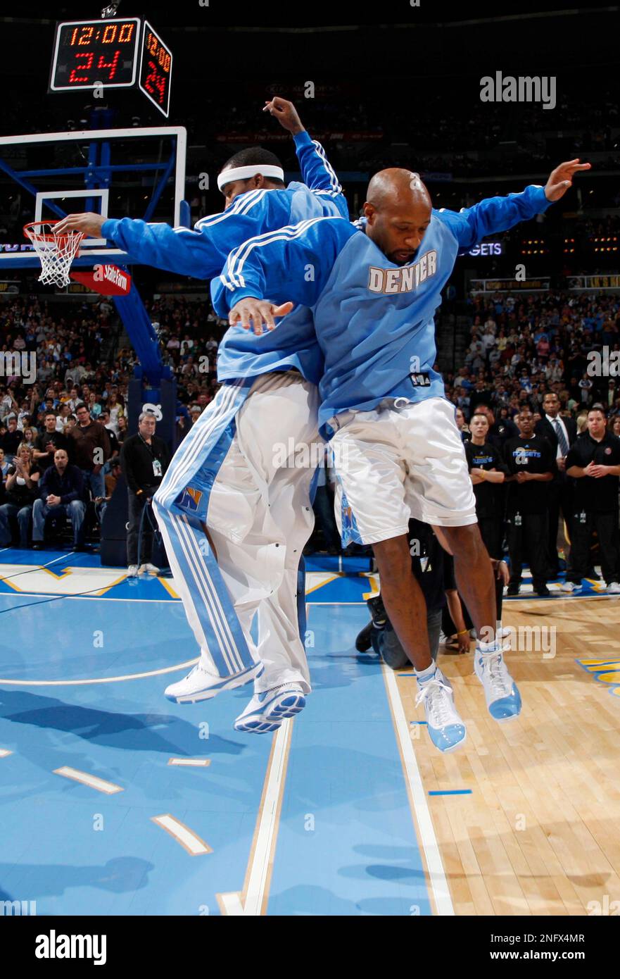 Denver Nuggets guards J.R. Smith, back, and Anthony Carter celebrate ...