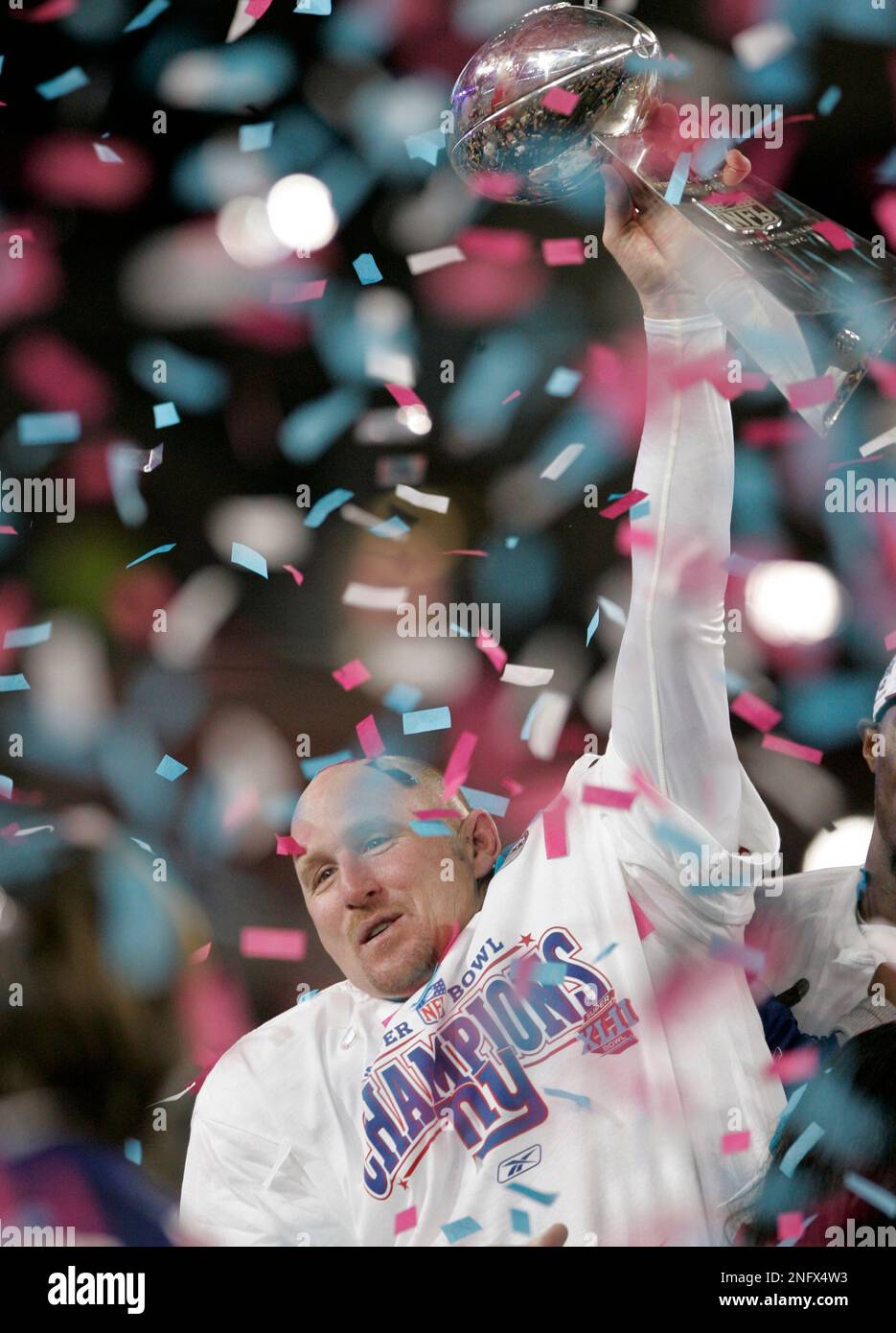 New York Giants punter Jeff Feagles (18) celebrates after the Giants ...