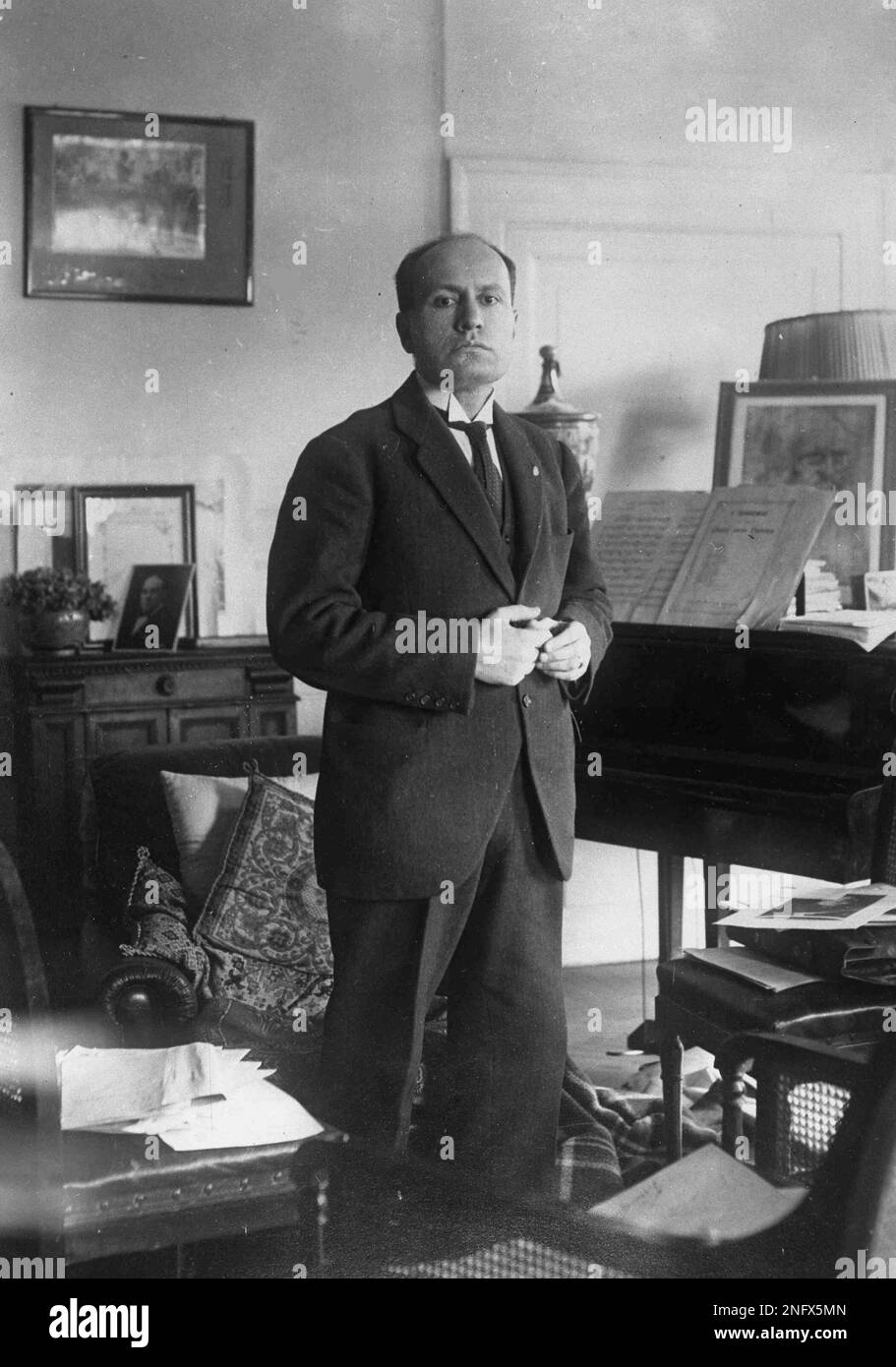 Italian Prime Minister Benito Mussolini in the music room of his home ...