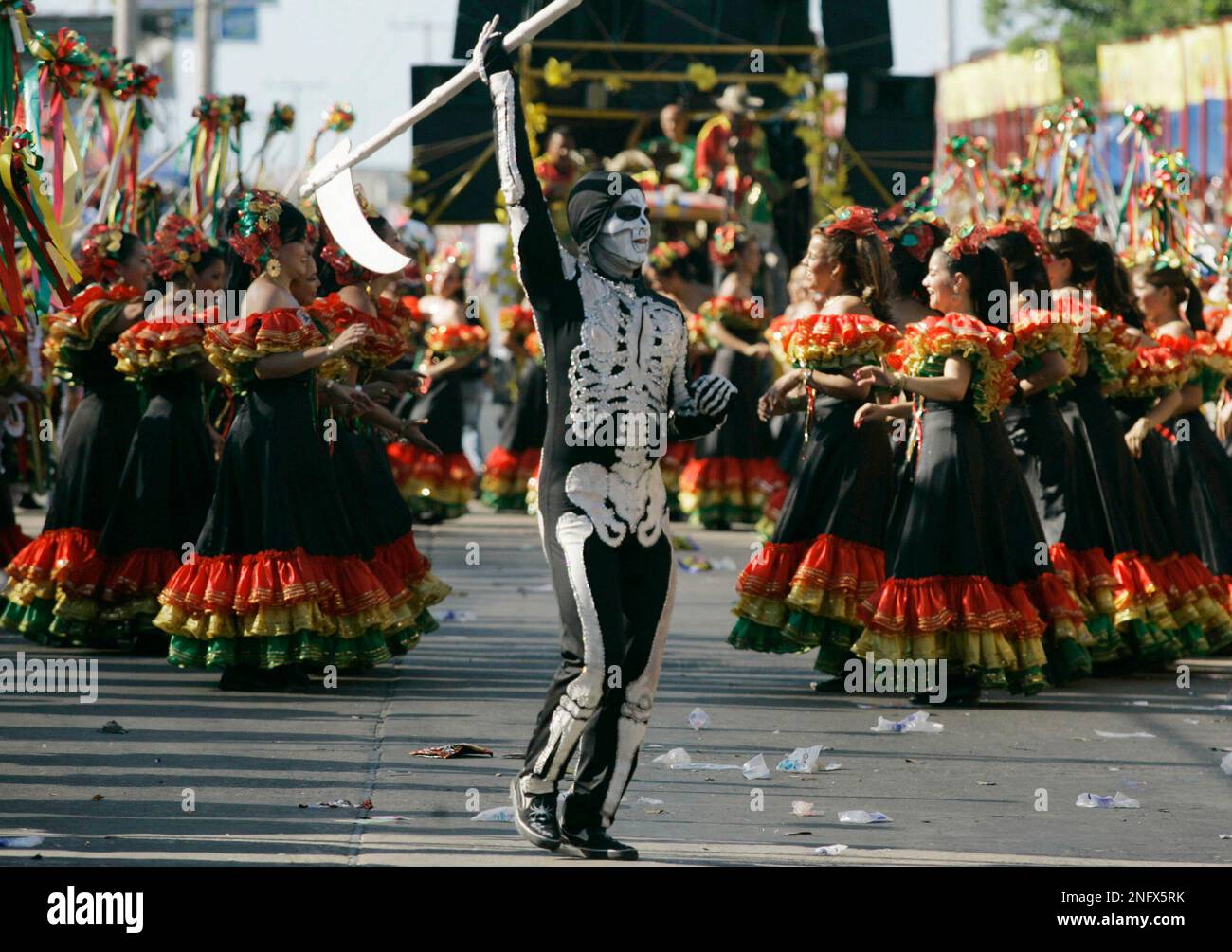 Revelers dance during the traditional carnival of Barranquilla ...