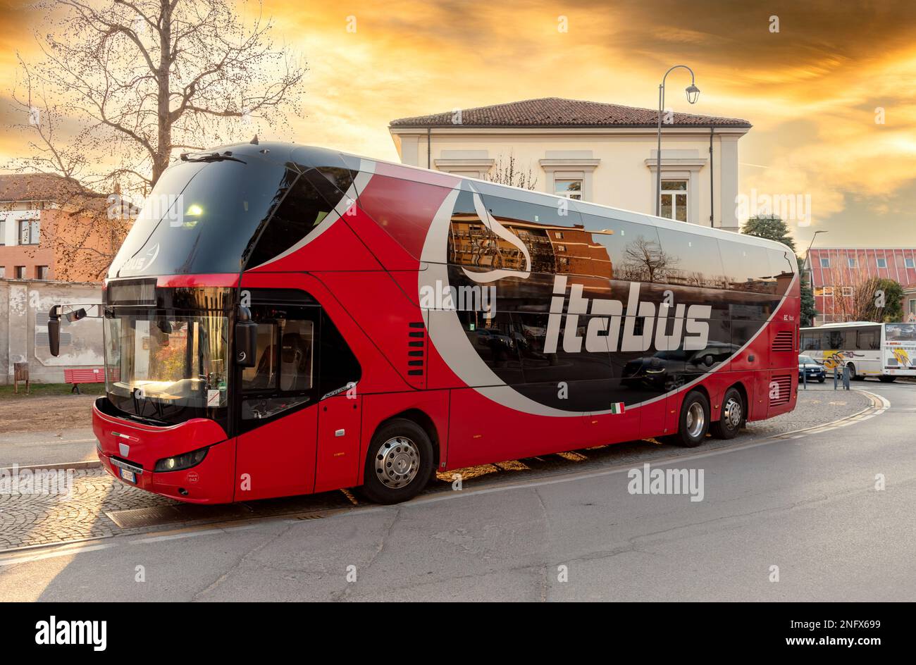 Savigliano, Italy - February 16, 2023. Bus at the station stop at ...