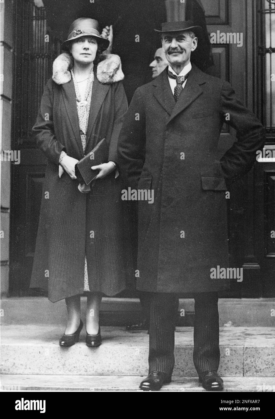 British Premier Sir Neville Chamberlain hides his budget secrets behind ...