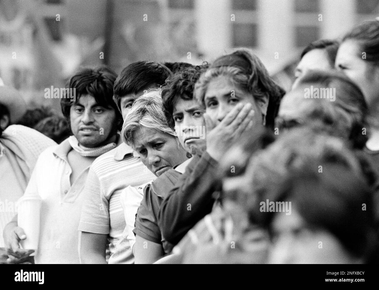Homeless people stand in line for food outside Juarez Hospital in ...