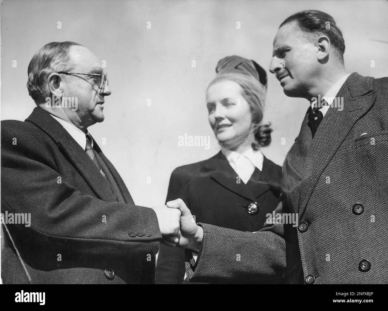 Sir Oswald Mosley, leader of the Union Movement, right, welcomes Oswald ...