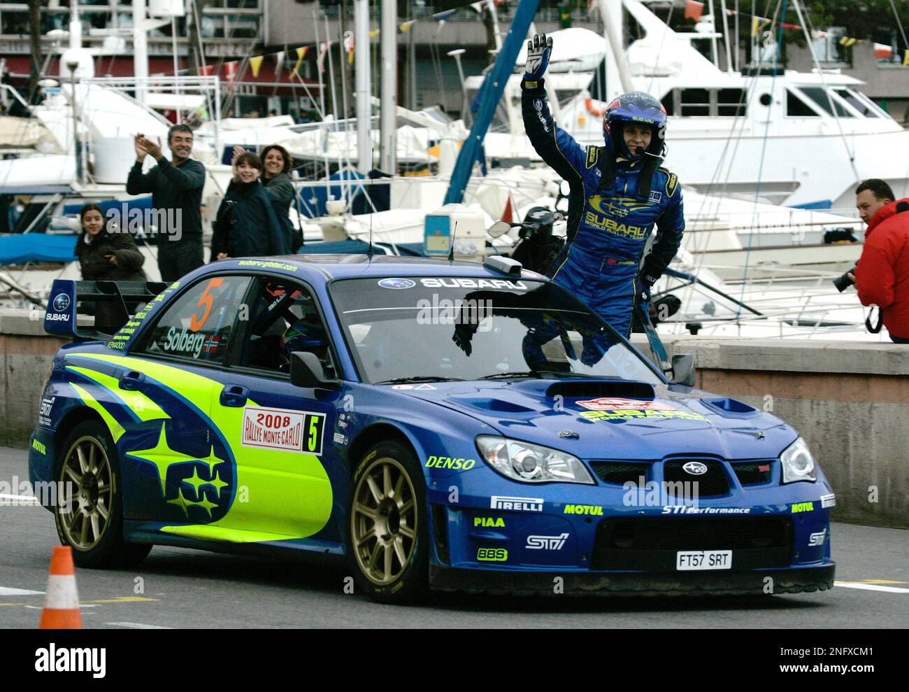 Peter Solberg of Norway, drive his Subaru Impreza with his co-driver ...