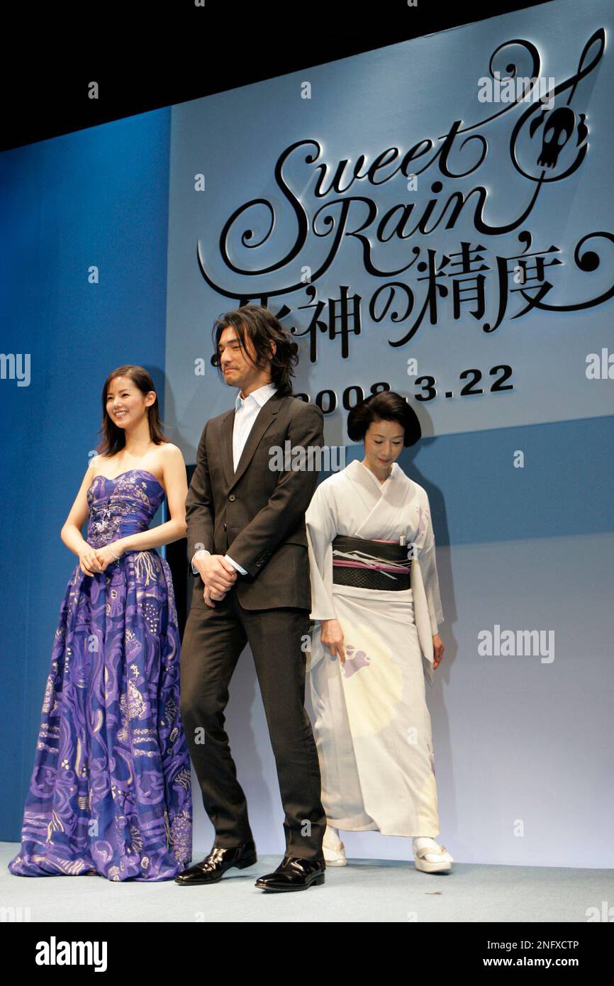 Japanese actor Takeshi Kaneshiro, center, actress Manani Konishi, left ...