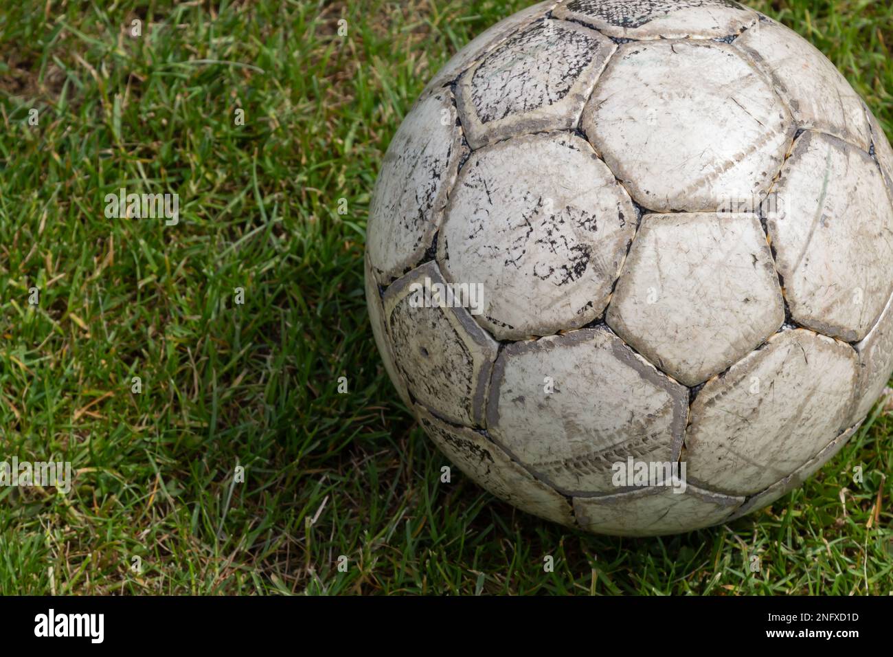 Playground sport exercise children playing football on the green hi-res ...