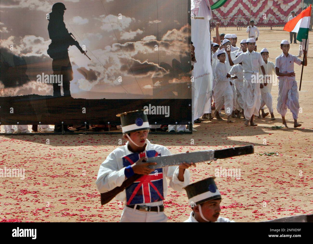 Indian school children enact a scene of India's pre-independence era ...