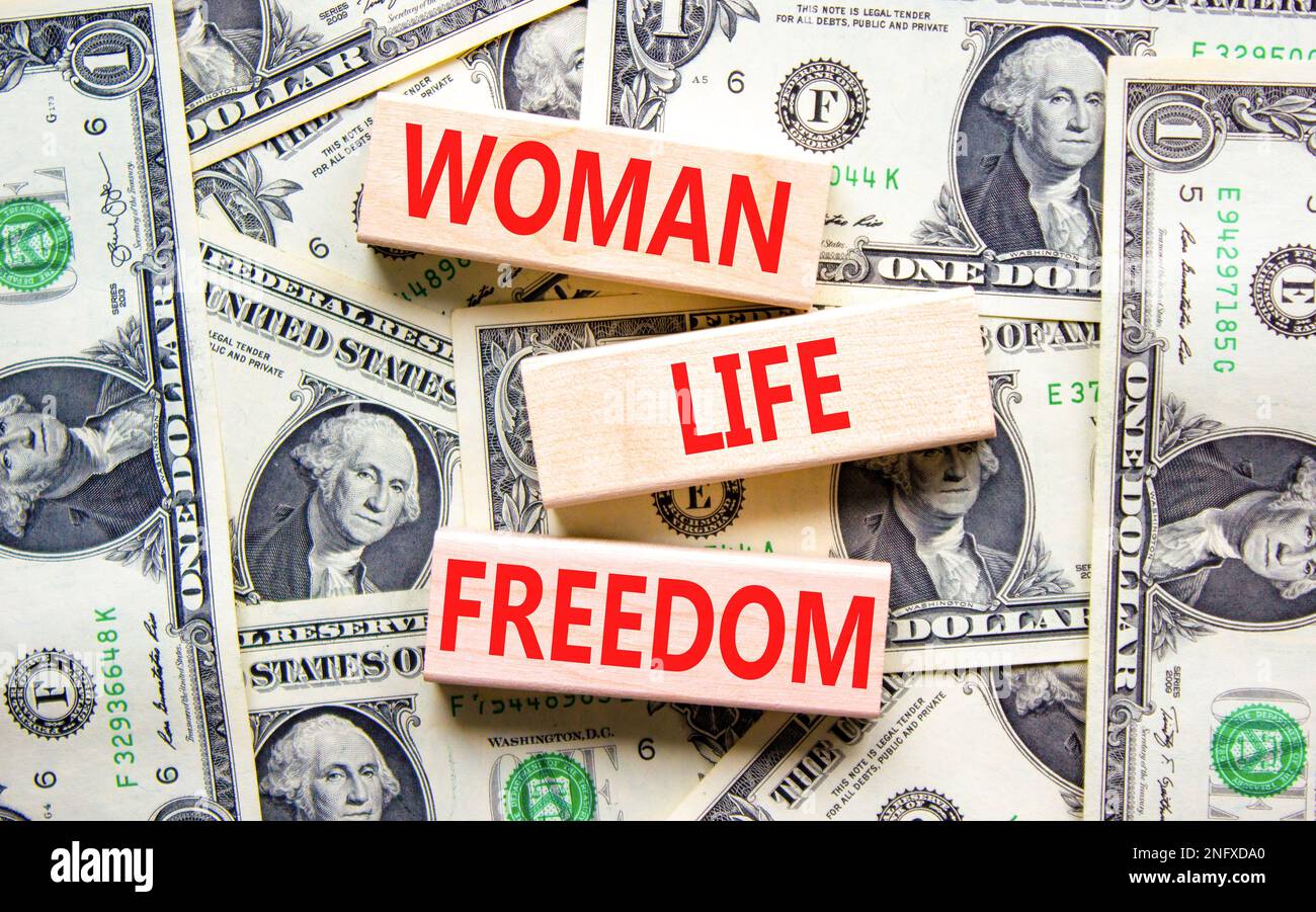 Woman life freedom symbol. Concept words Woman Life Freedom on wooden ...