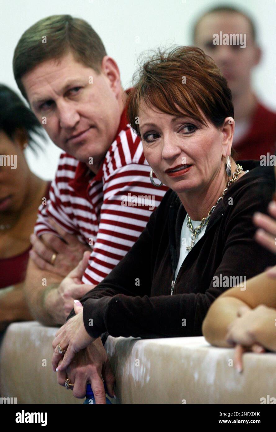 Univ. of Alabama gymnastics coach Sarah Patterson talks with her team ...