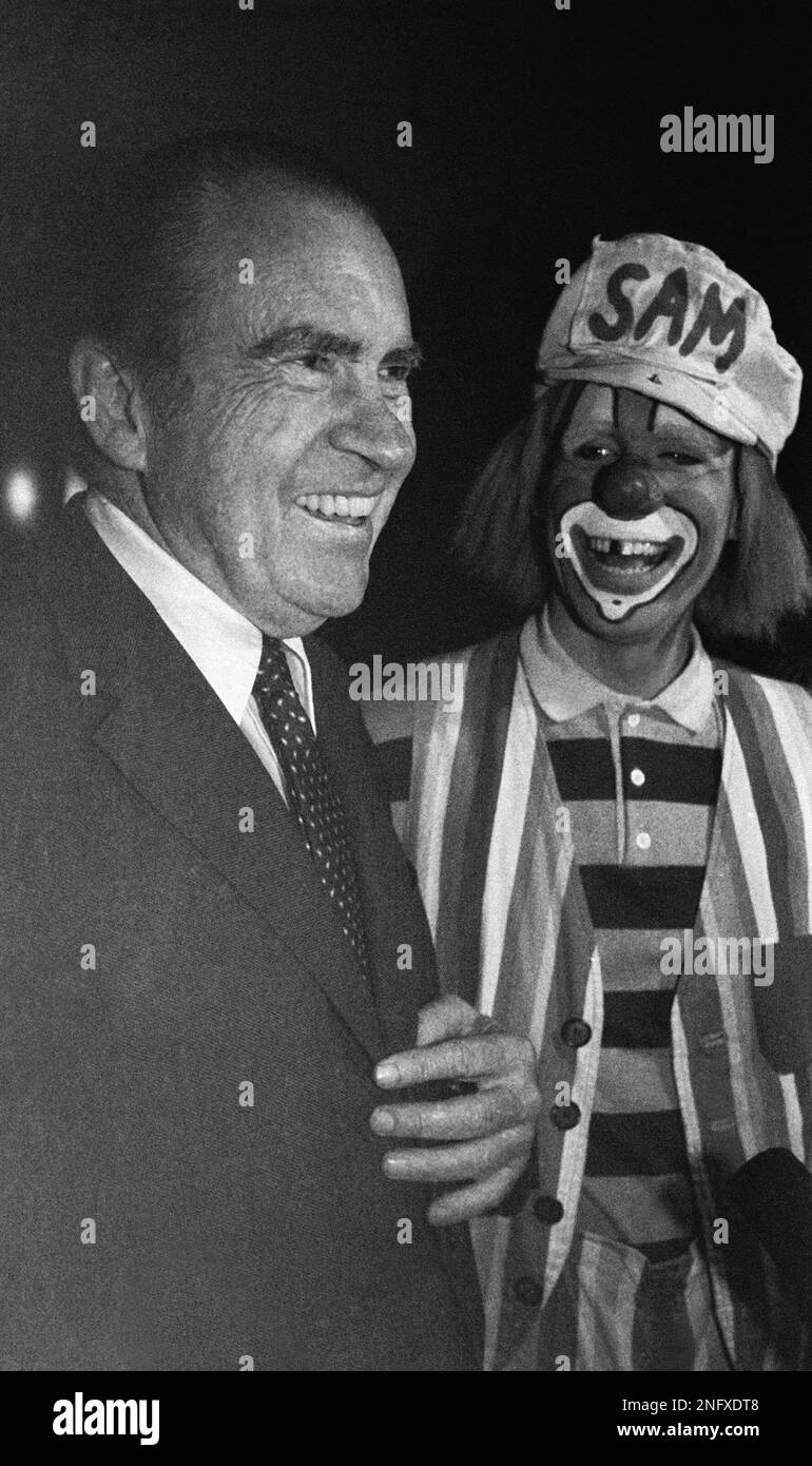 Former President Richard Nixon shares a laugh with "Sam" the clown from ...