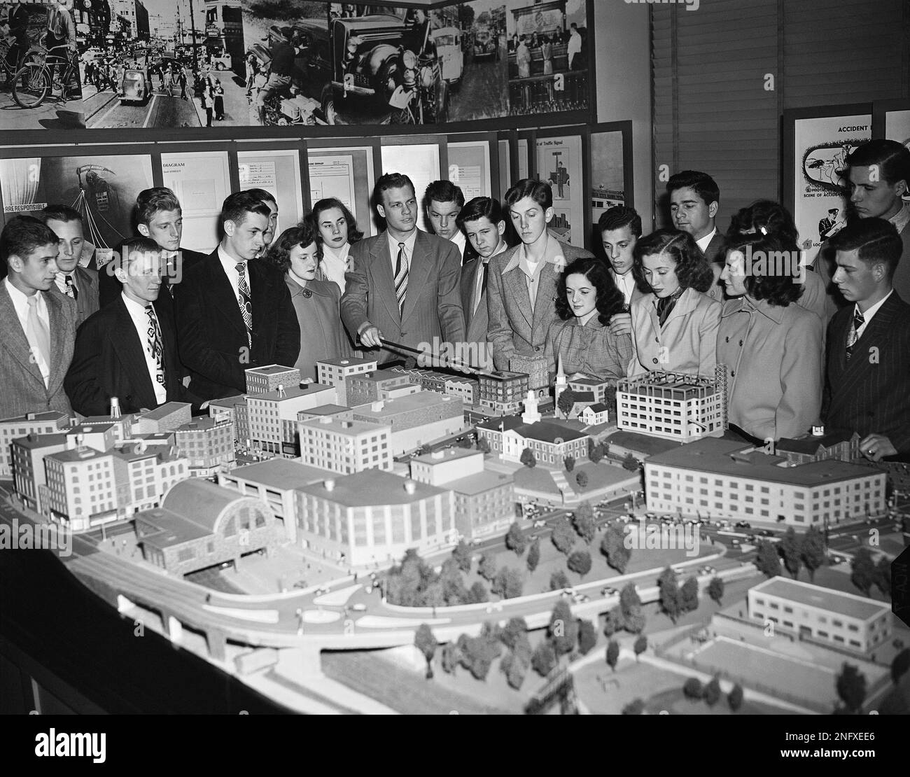 L. Edward Stoner (with pointer) describes traffic diorama to Upper ...