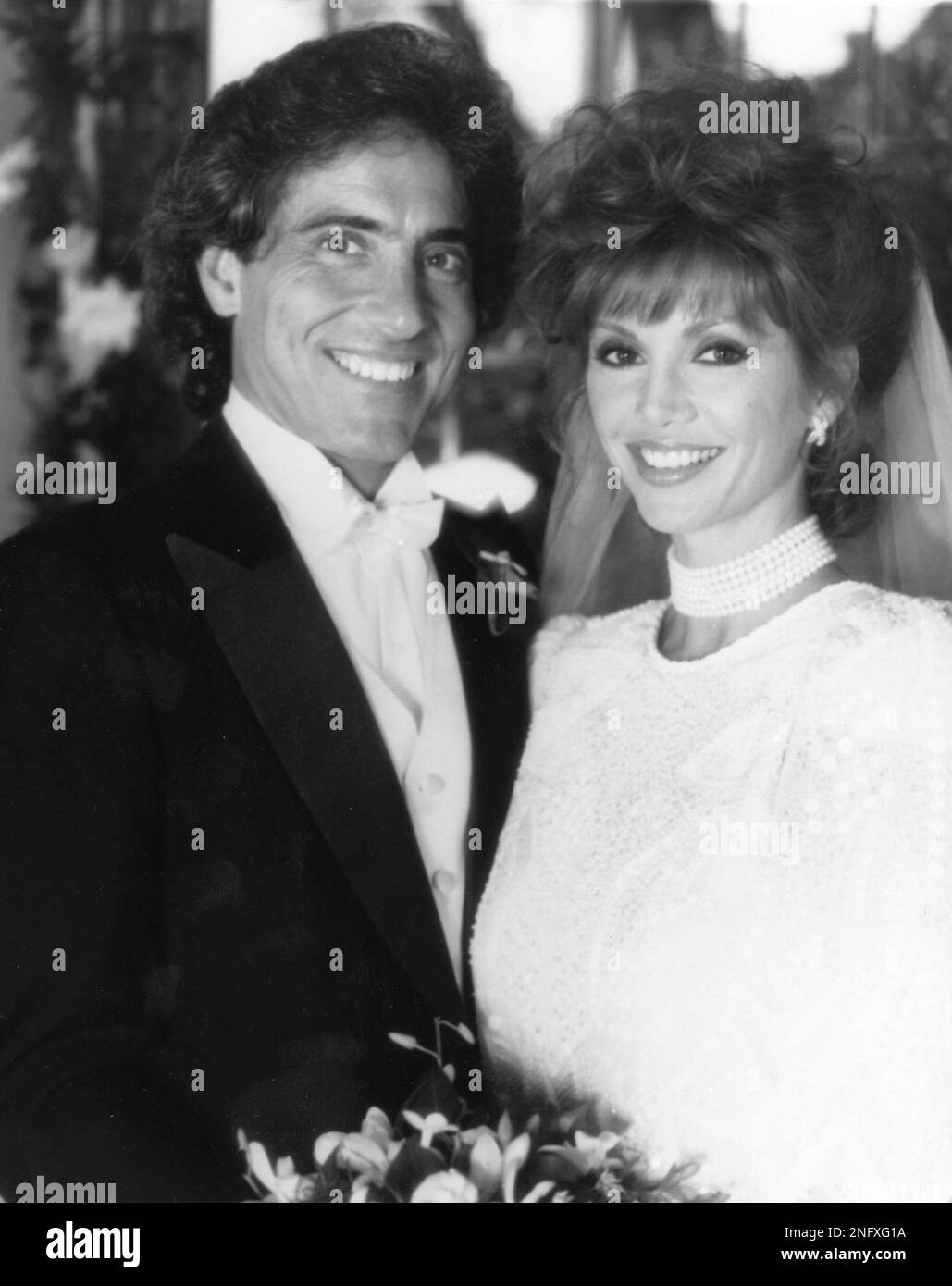 Dr. Harry Glassman looks at his wife, "Dallas" star U.S. American ...