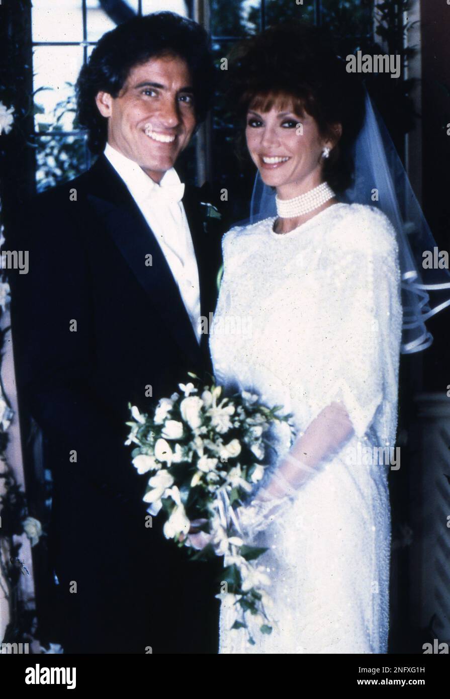 Dr. Harry Glassman looks at his wife, "Dallas" star U.S. American ...