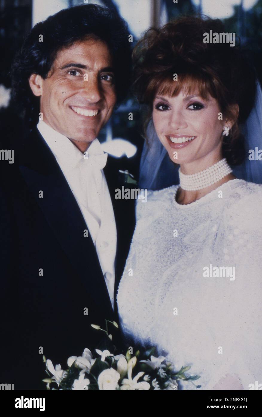 Dr. Harry Glassman looks at his wife, "Dallas" star U.S. American ...