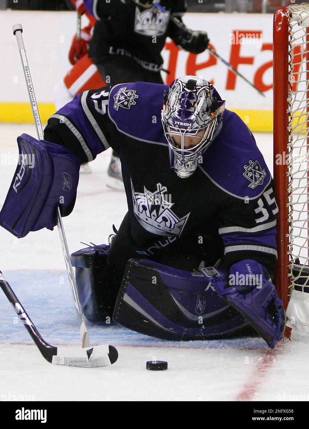 Los Angeles Kings goalie Jason LaBarbera (35) blocks the goal during ...