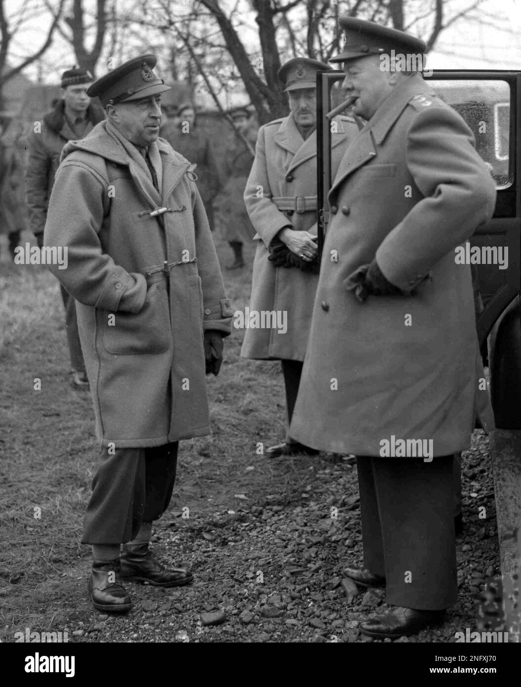Stepping from his car Britain's Prime Minister Winston Churchill, right ...