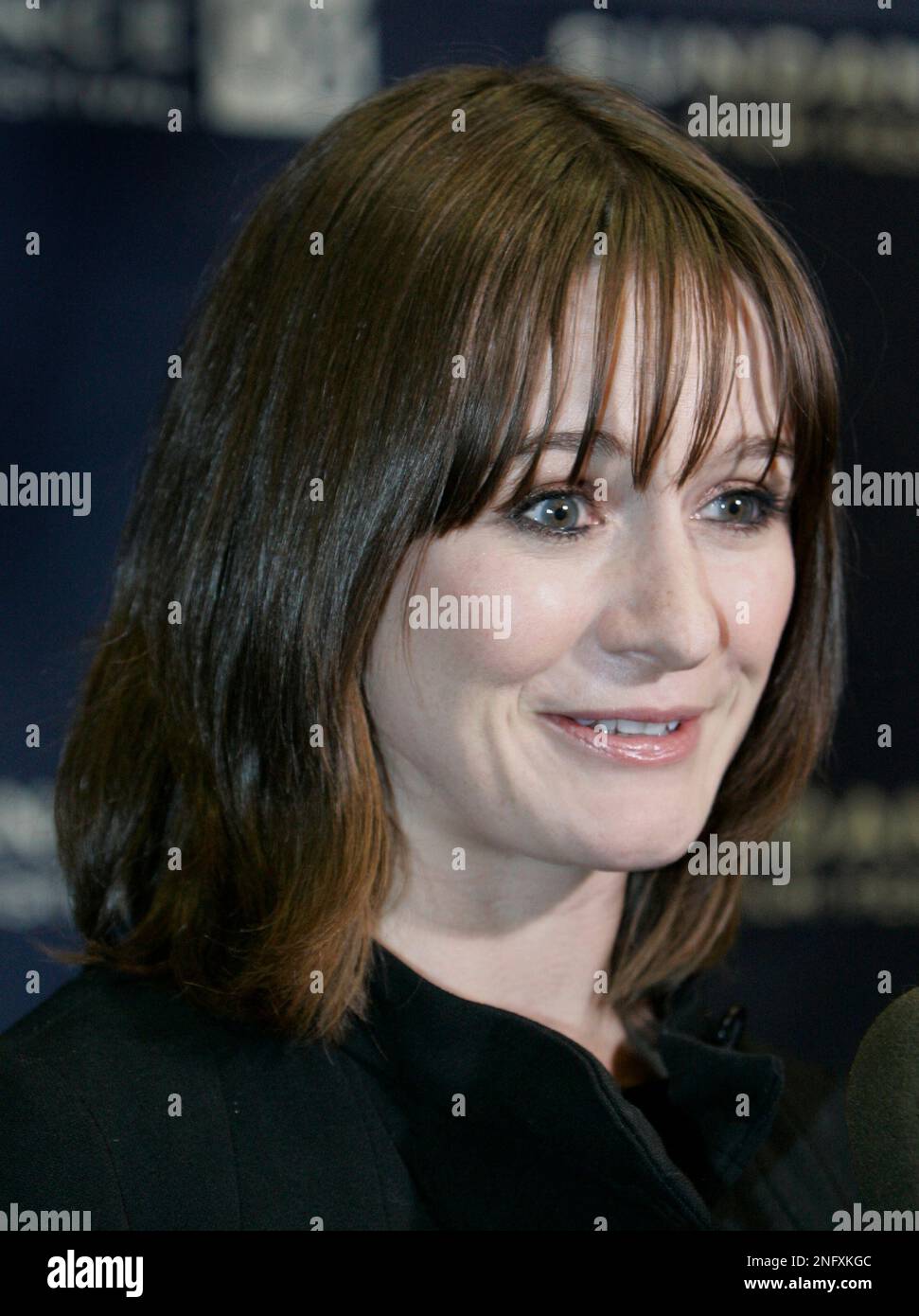Actress Emily Mortimer walks the red carpet for the premiere of her ...