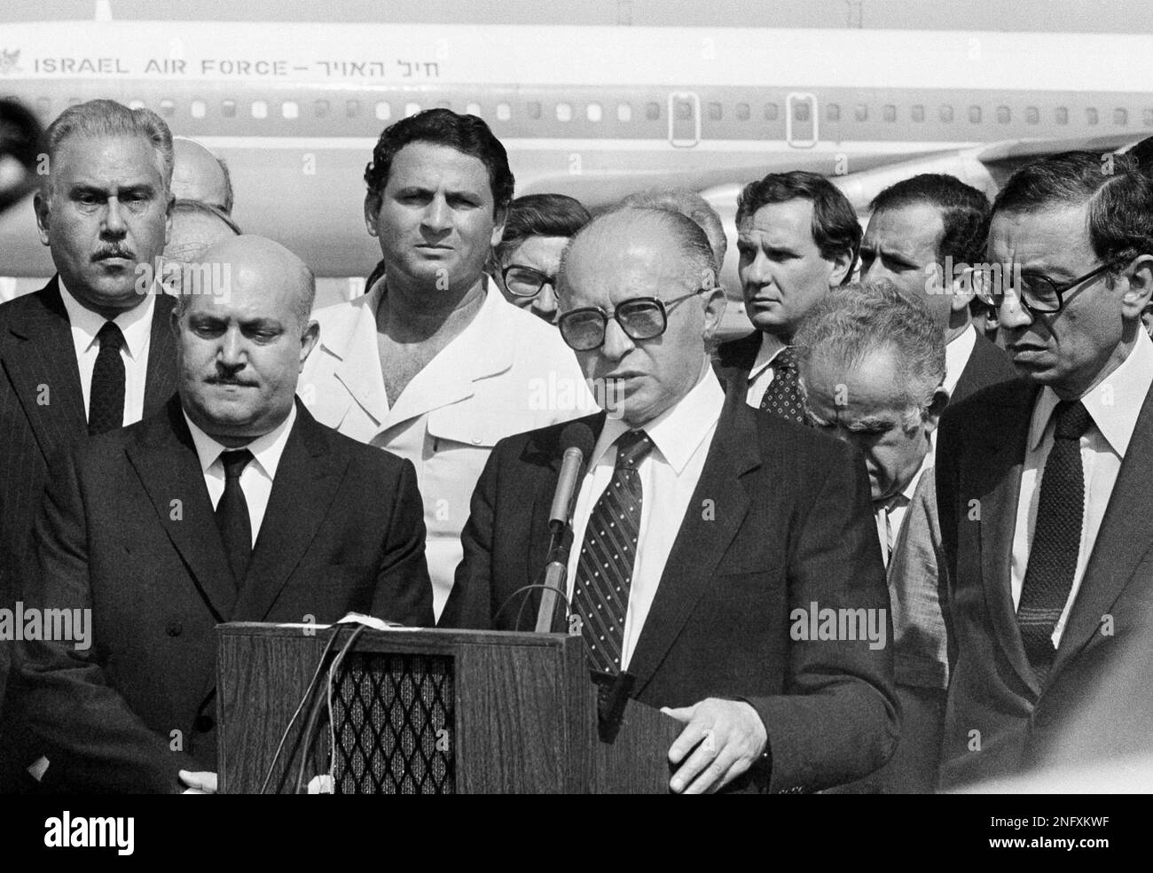 Israeli Prime Minister Menachem Begin, right, gives a short statement ...