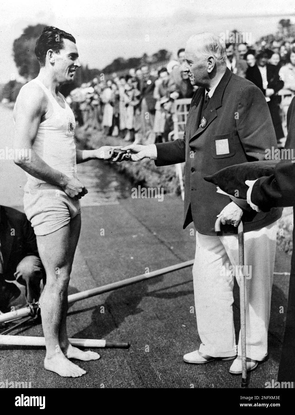 Mervyn Wood of Australia, left, receives his gold medal for the men's ...