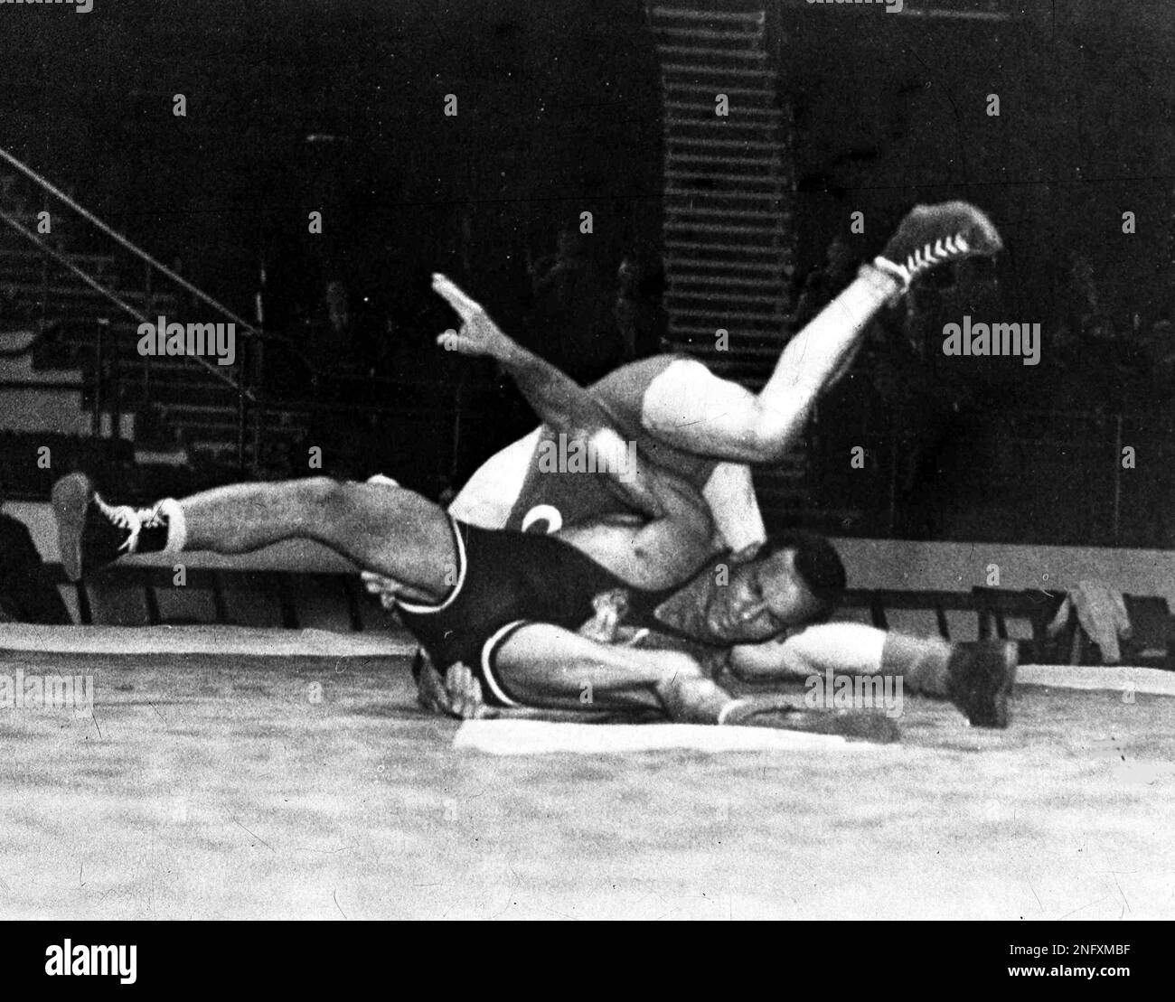 Egypt's Ali Mahmoud Hassan, bottom facing camera, fighting Turkey's ...