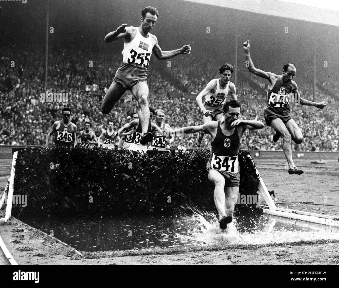 Competitors in the men's Olympic Games 3,000-metres Steeplechase Final ...