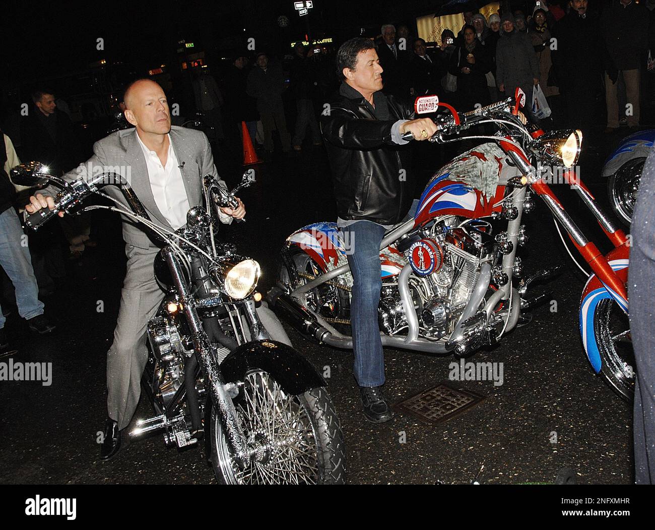 Actors Bruce Willis and Sylvester Stallone ride motorcycles after an ...