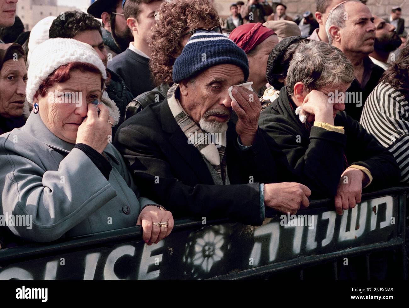 Some of the tens of thousands of Israelis who lined the route of the ...