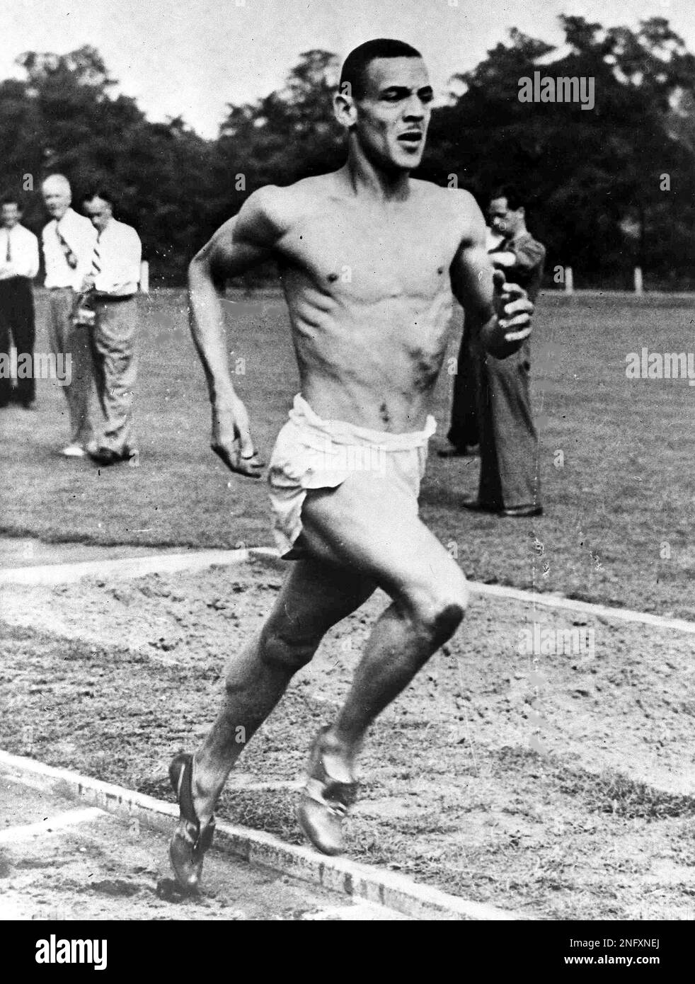 American athlete Mal Whitfield trains for the 400-metre sprint, on a ...
