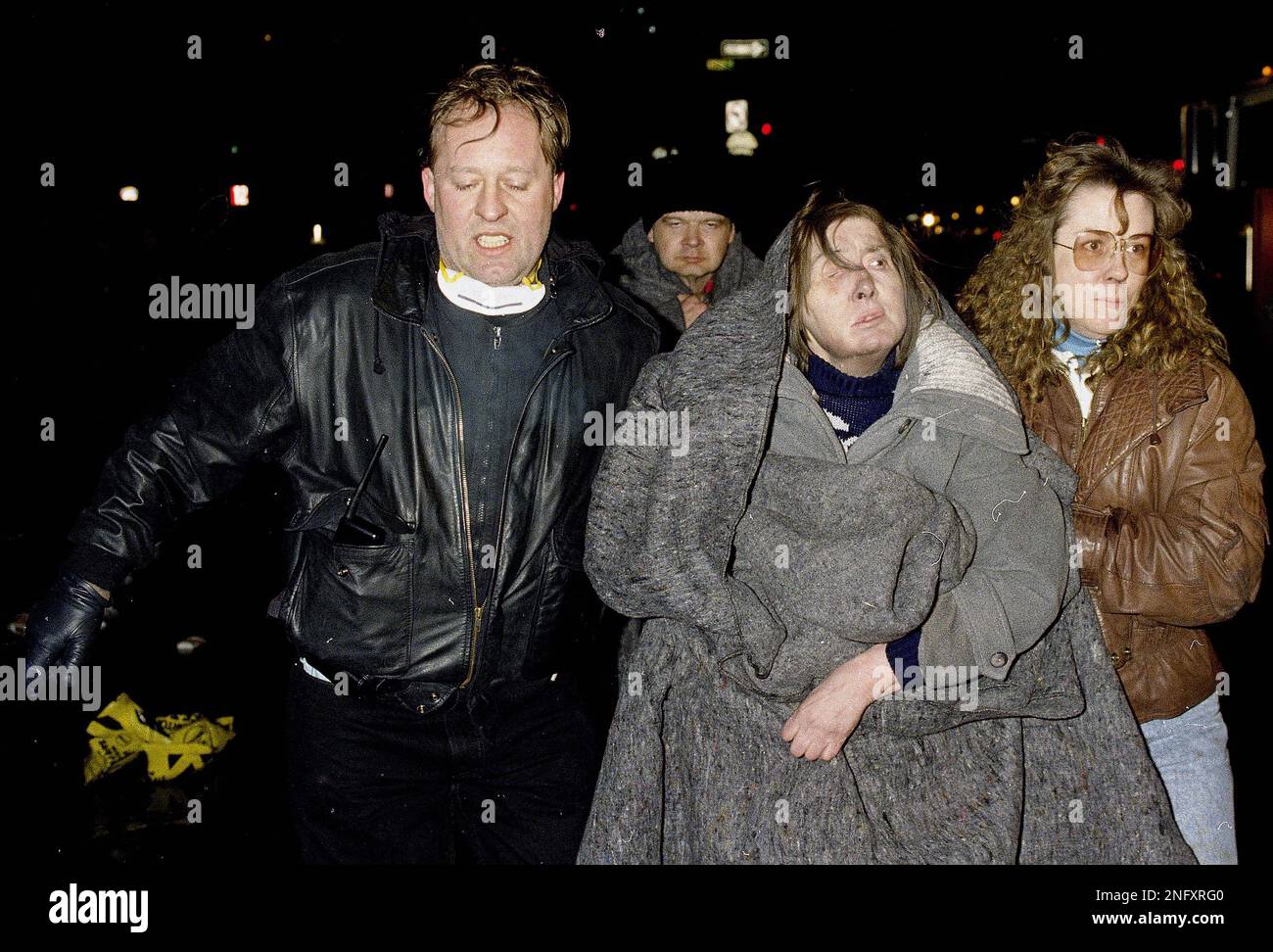 People are led to safety from the World Trade Center after an explosion ...