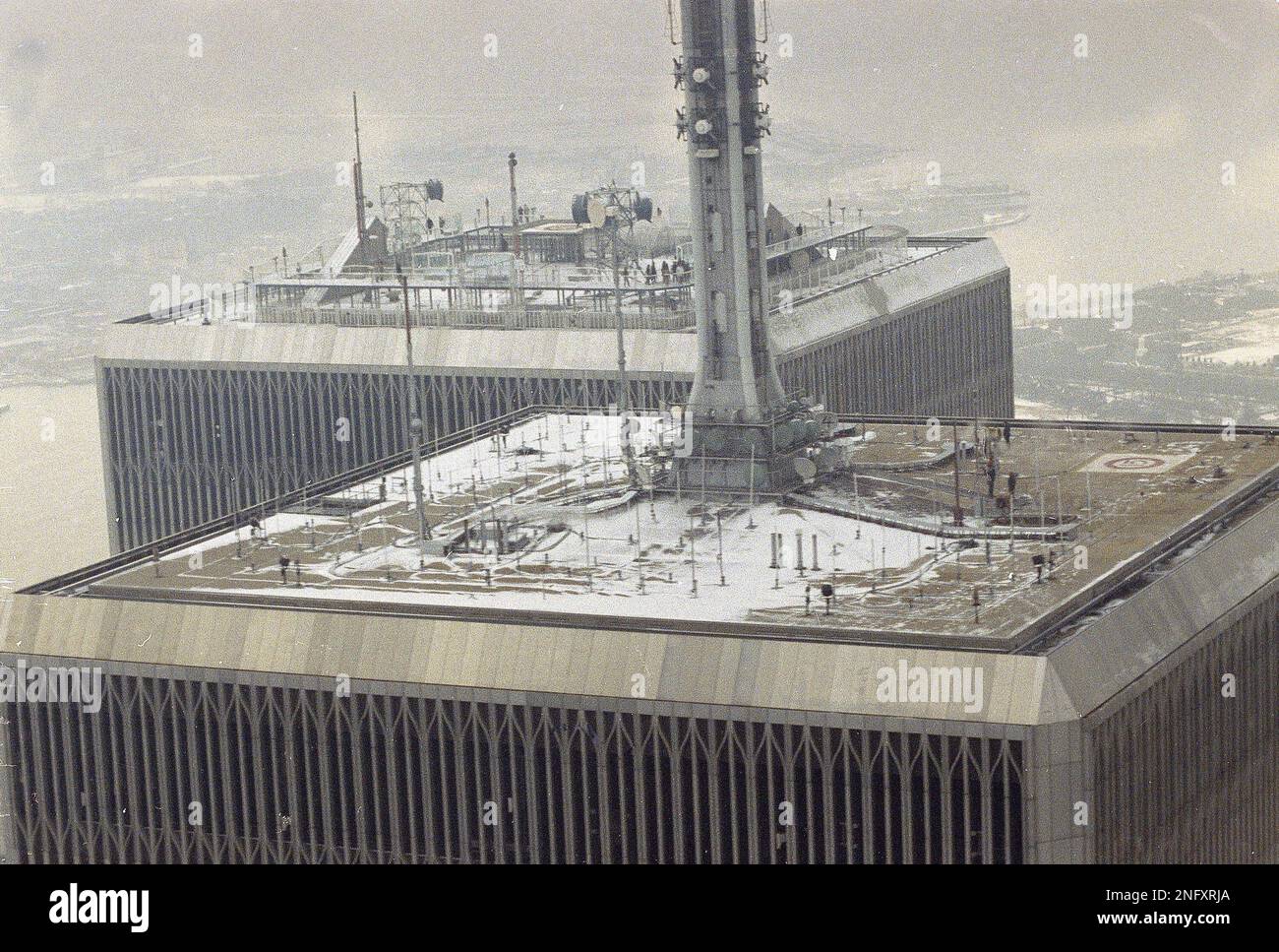 People line the roof of the World Trade Center in New York following an ...