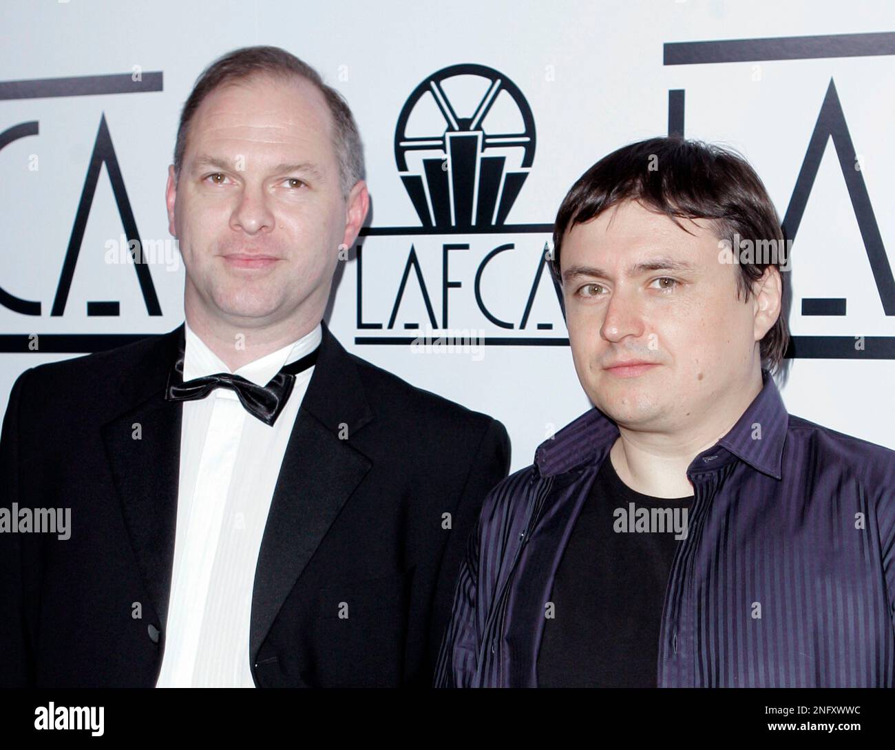 Actor Vlad Ivanov, left, and Director Cristian Mungiu arrive at the ...