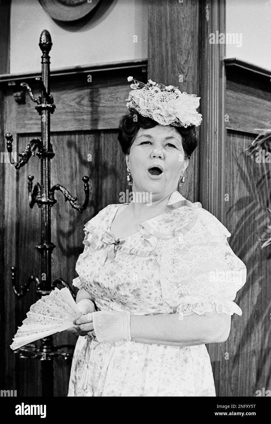 Mrs. Elva Miller, whose tremulous soprano defies description, isn't ...