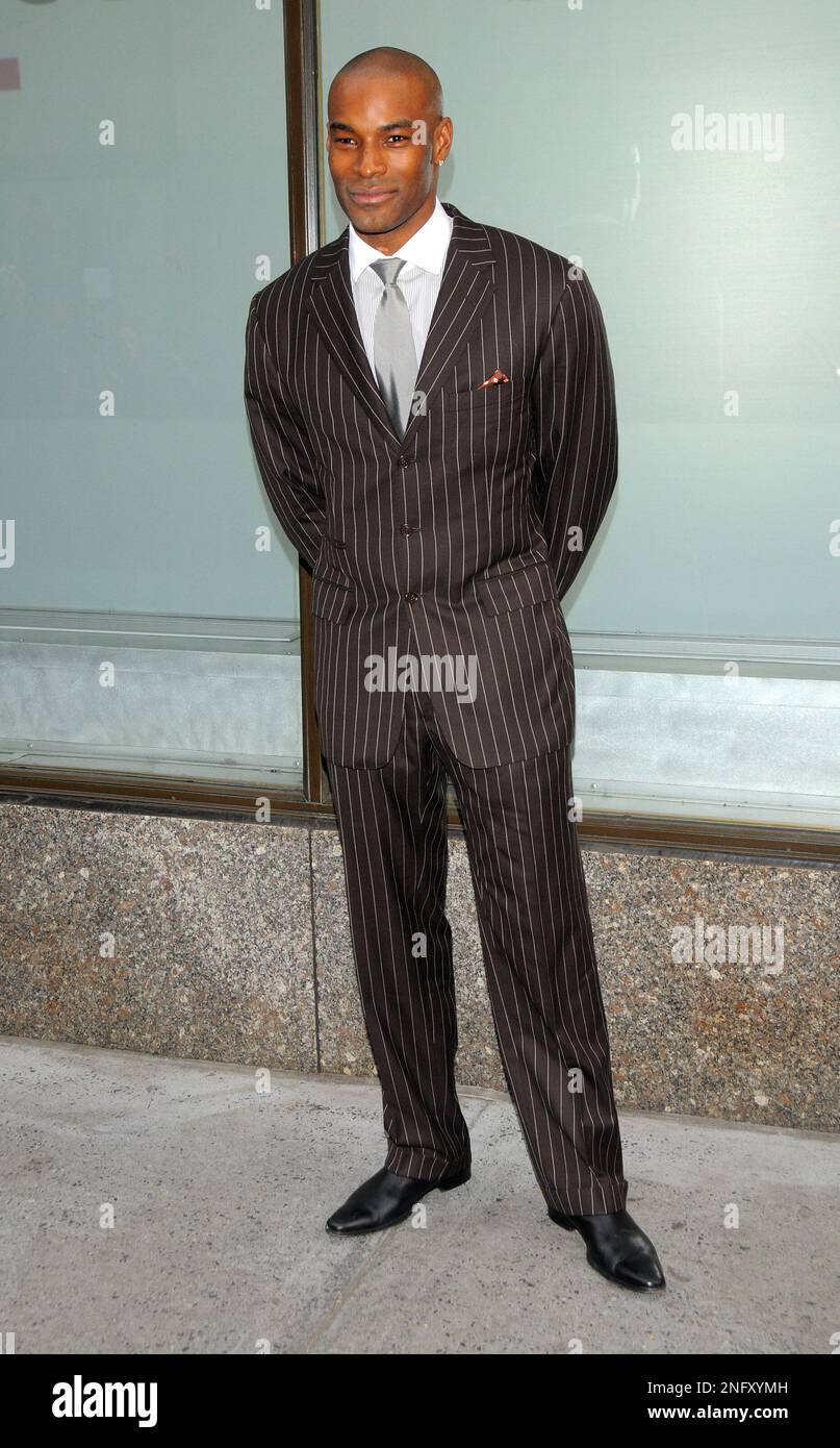 Model Tyson Beckford poses for pictures outside the NBC Experience ...