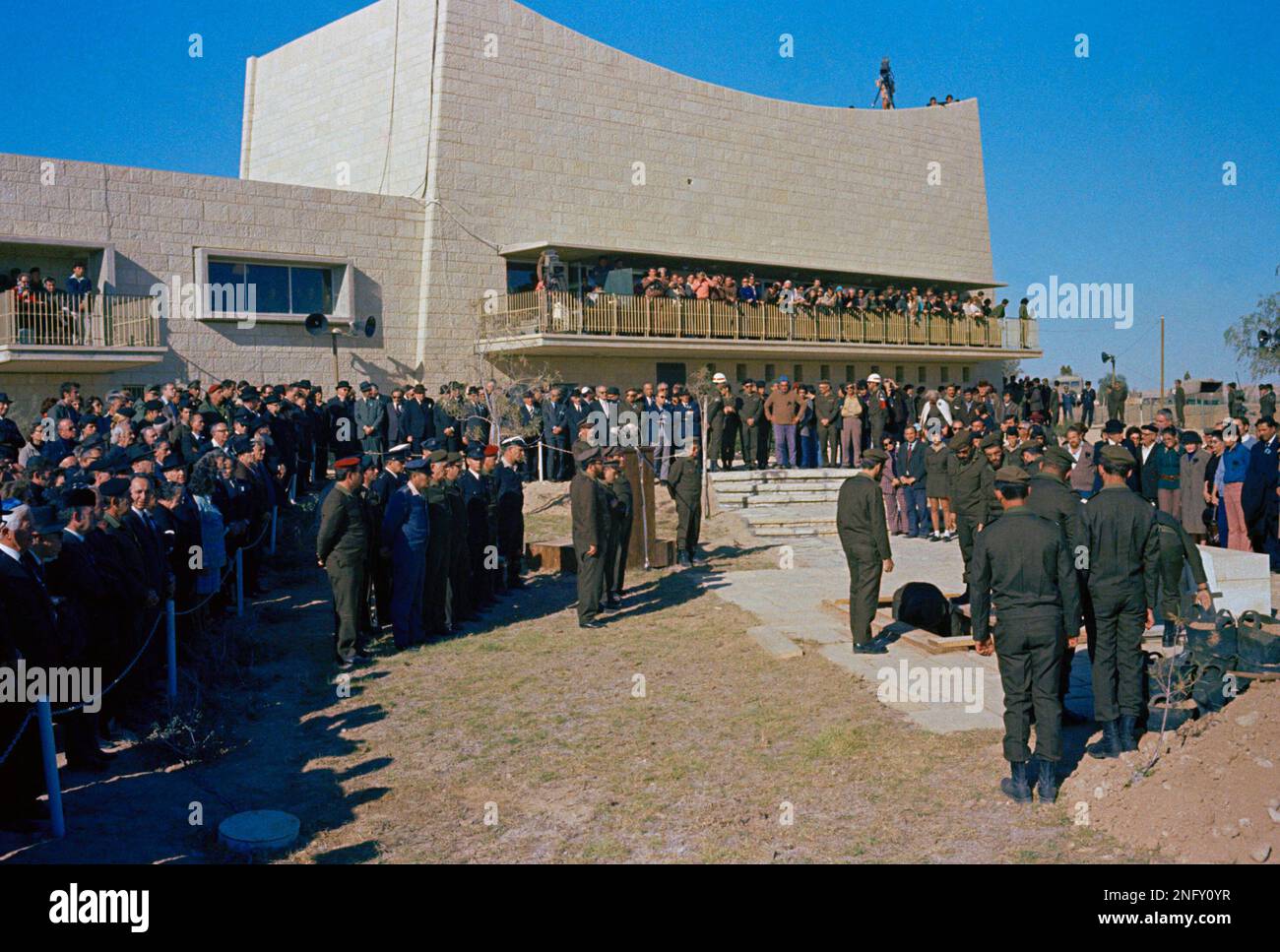 The funeral of David Ben-Gurion at his Kibbutz home in the Negev Desert, where he was buried ...