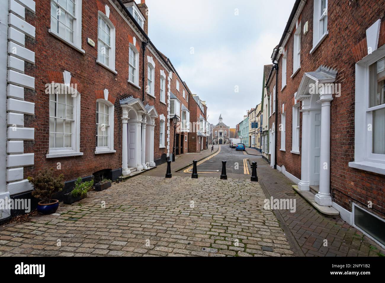 Grand terraced Georgian buildings leading to the Guidhall in Market ...