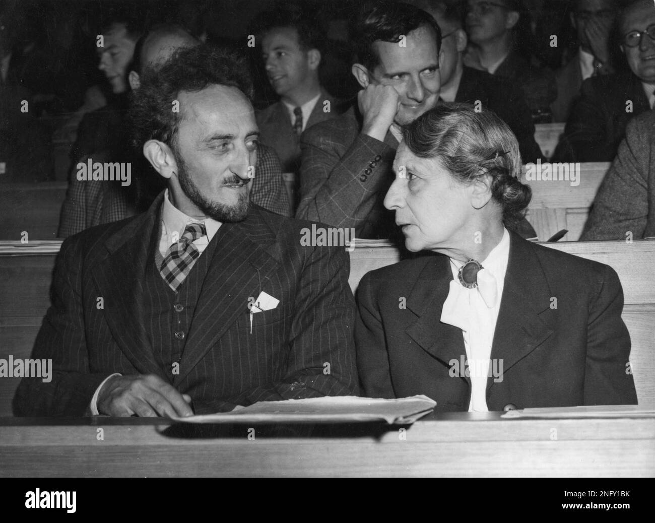 Austrian born physicist Prof. Dr. Lise Meitner, right, chats with ...