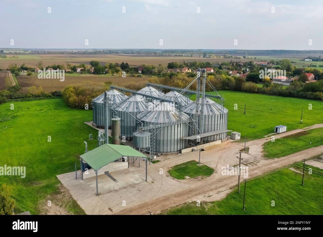 Agricultural silos on the farm in autumn, close-up drone view ...