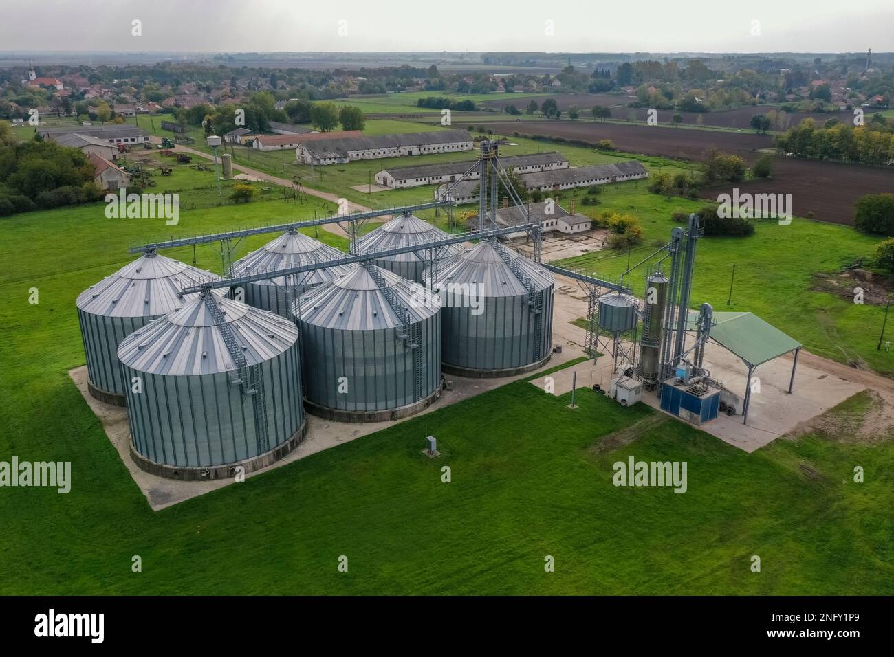 Agricultural silos on the farm in autumn, close-up drone view ...